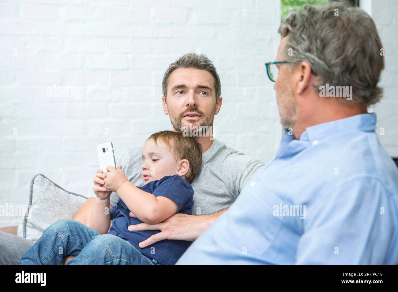 Generations talk hi-res stock photography and images - Alamy