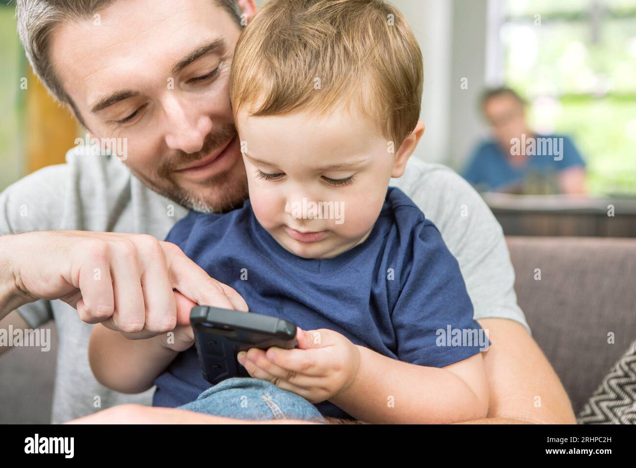 Boy helps senior hi-res stock photography and images - Alamy
