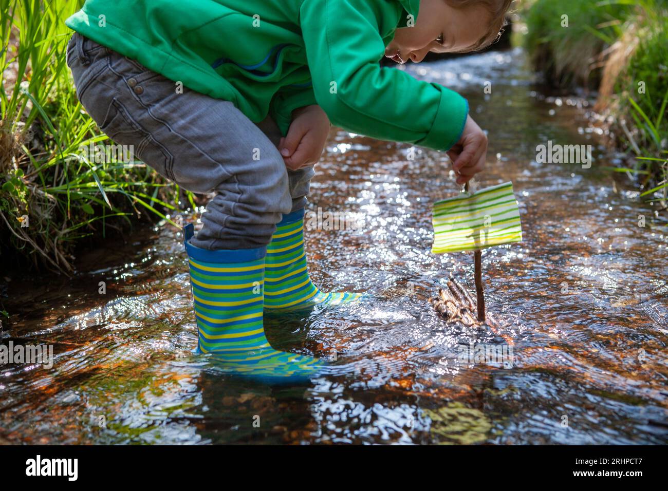 Child with raft Stock Photo - Alamy