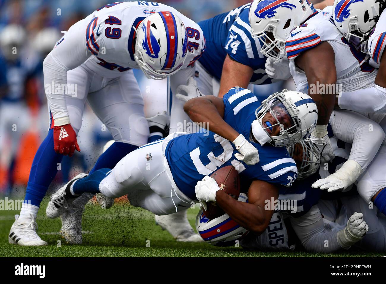 Indianapolis Colts running back Kenyan Drake, bottom, dives forward ...