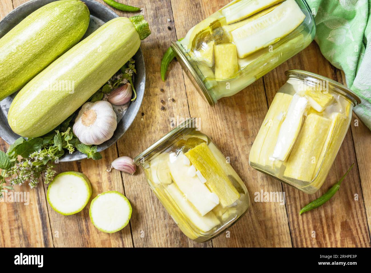 Healthy homemade fermented food. Pickled zucchini with mint preserved ...