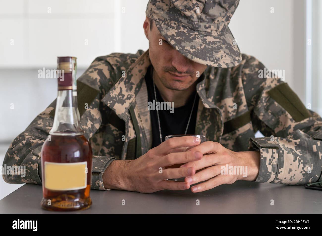 young attractive wasted and depressed addict and alcoholic man with ...