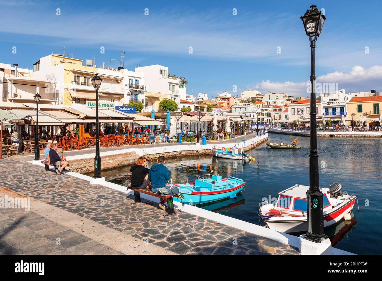 Harbour promenade at Voulismeni Lake, Agios Nikolaos, Crete, Greece ...