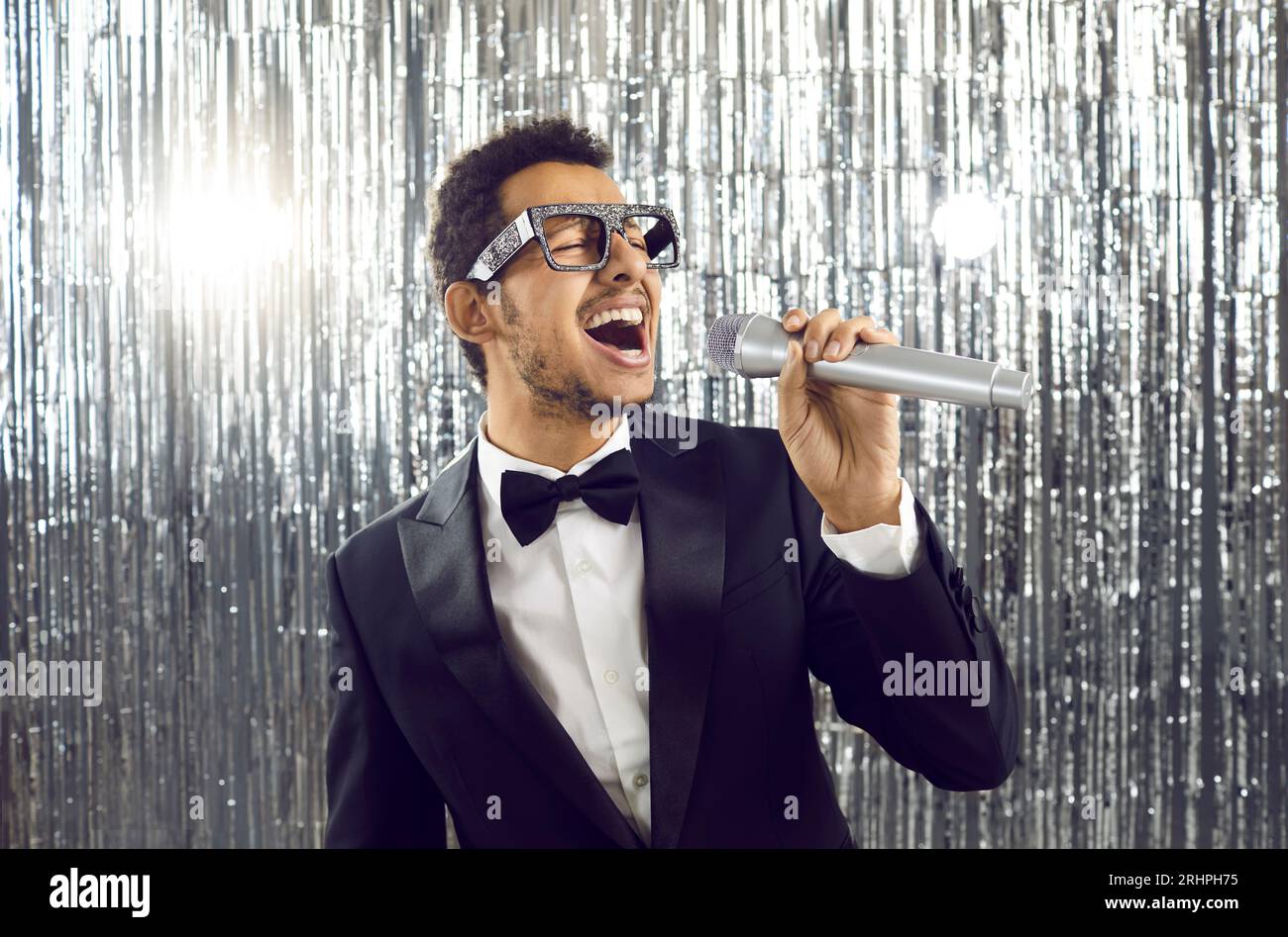 Singer microphone man hi-res stock photography and images - Alamy