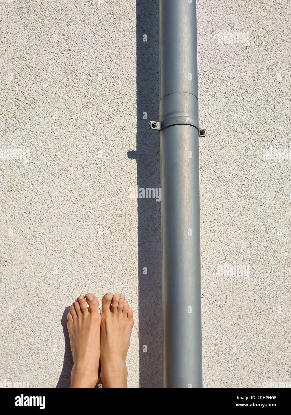 Feet on wall hi-res stock photography and images - Alamy
