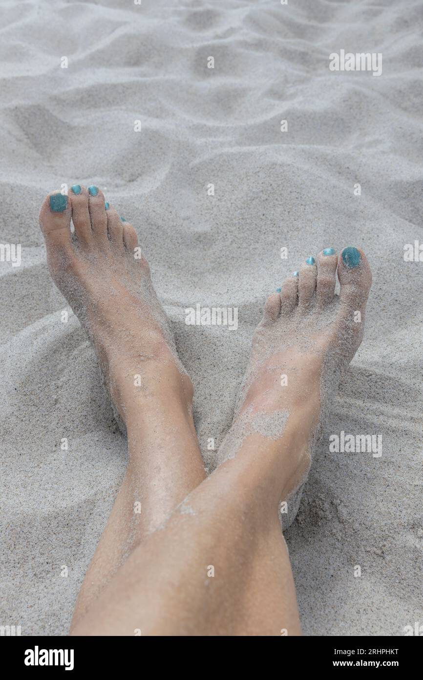 Germany, Baltic Sea, fine sand, woman feet with painted toenails Stock ...
