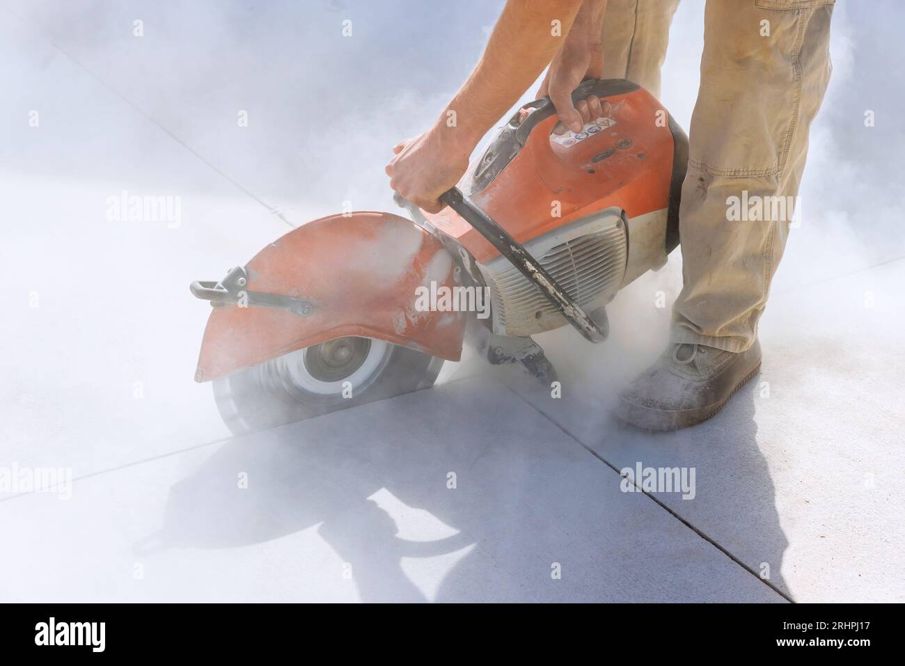 Efficient Concrete Sidewalk Removal with a Diamond Blade Saw by ...