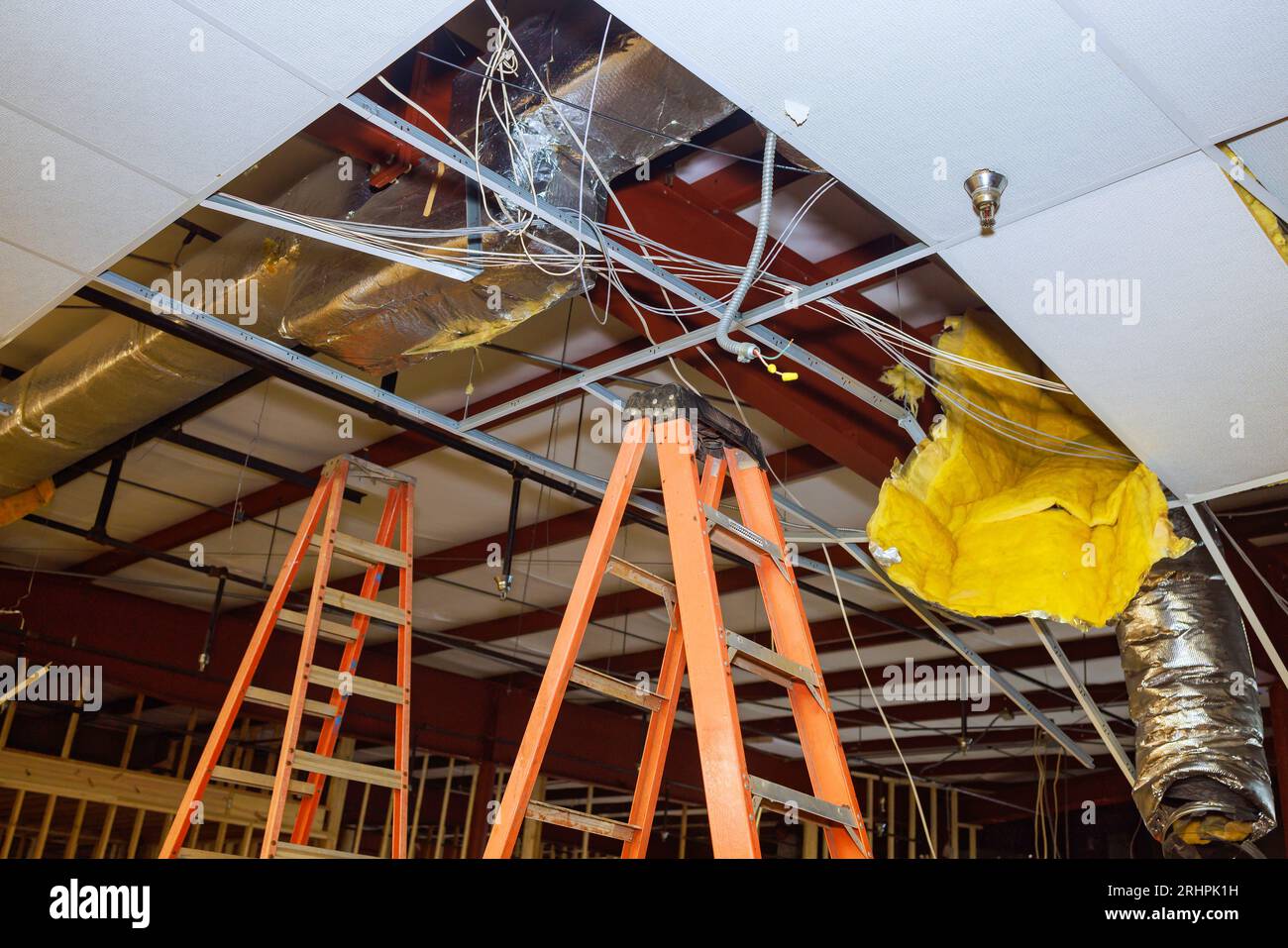 Old ceiling is taken down as part of reconstruction process for ...