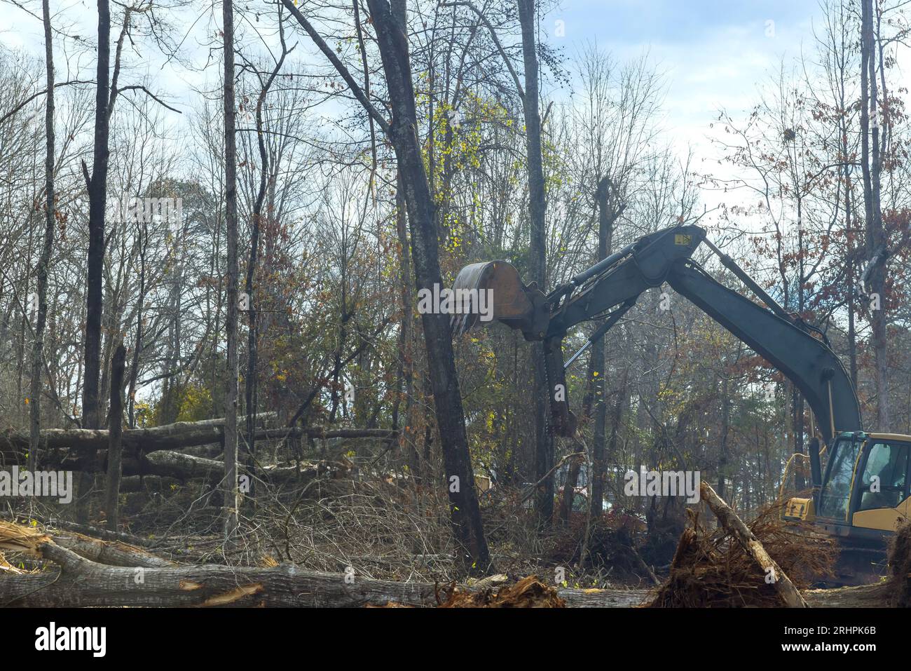 Worker prepare ground for building house with using excavator is to ...