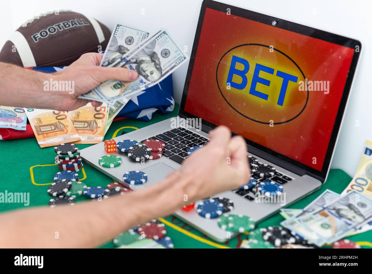 Close up cropped shot of male hands making bets using gambling mobile ...