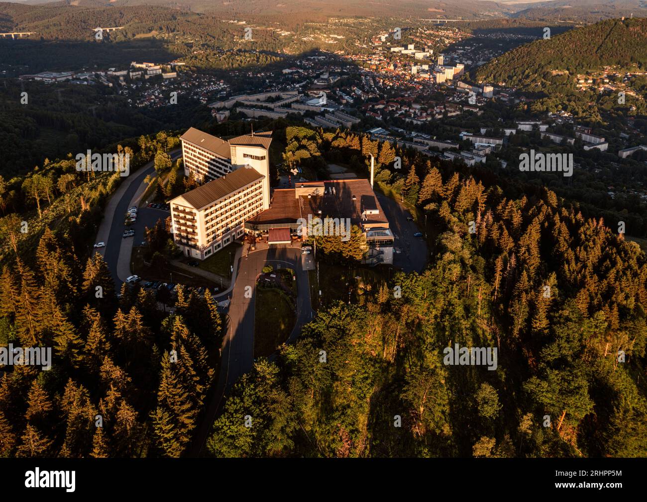 Germany, Thuringia, Suhl, hotel, mountain, city in background, morning ...