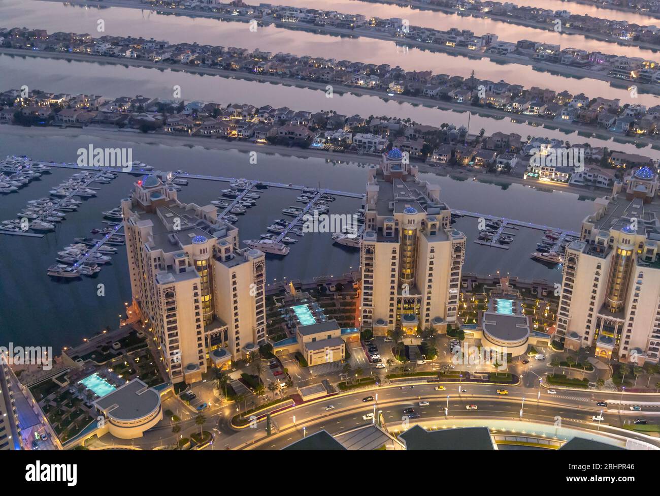 Dubai city skyscrapers in the evening in the lights. Travel concept ...