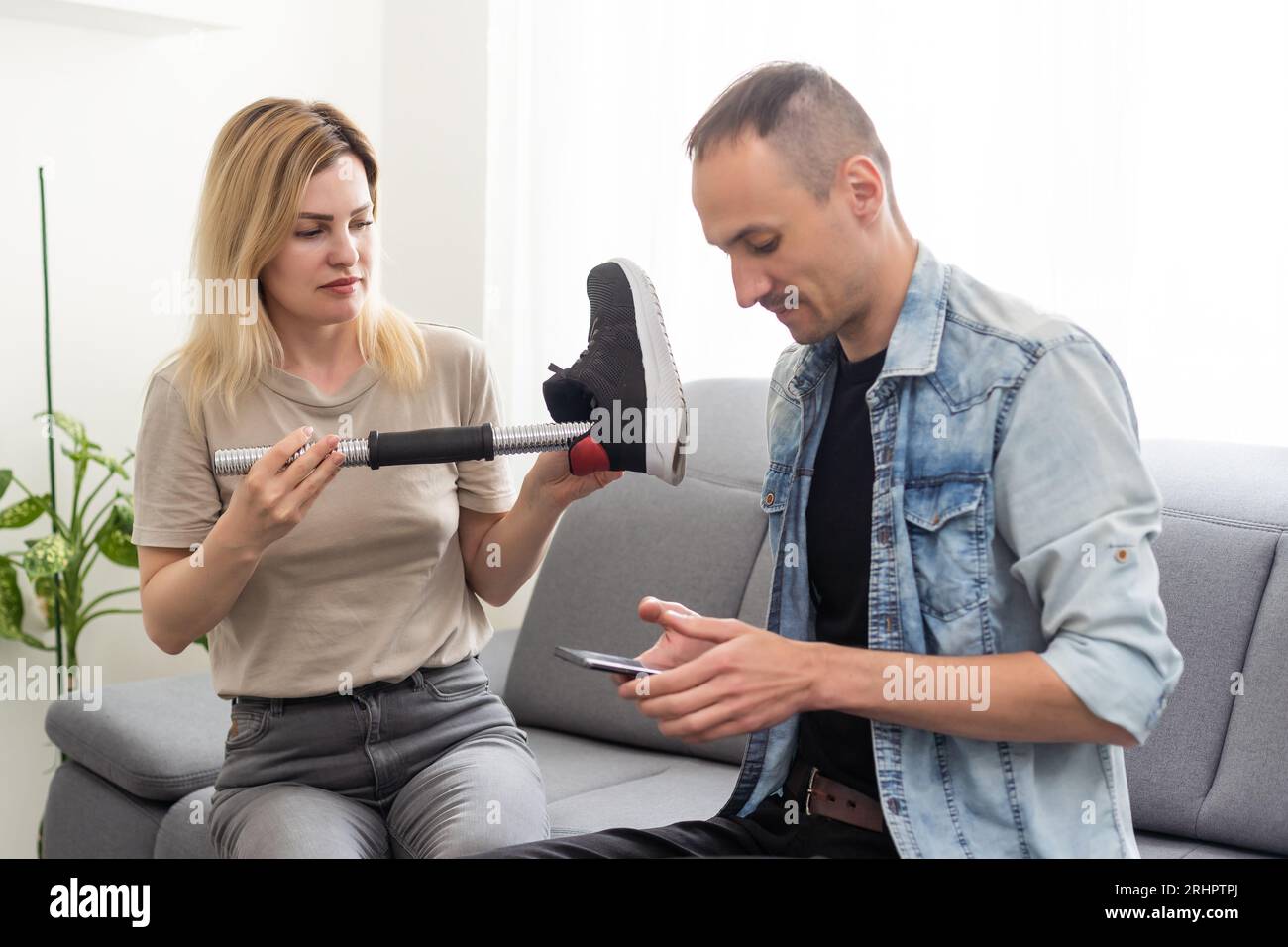 Modern Hospital Physical Therapy: Doctor Uses Tablet Computer, Helps ...