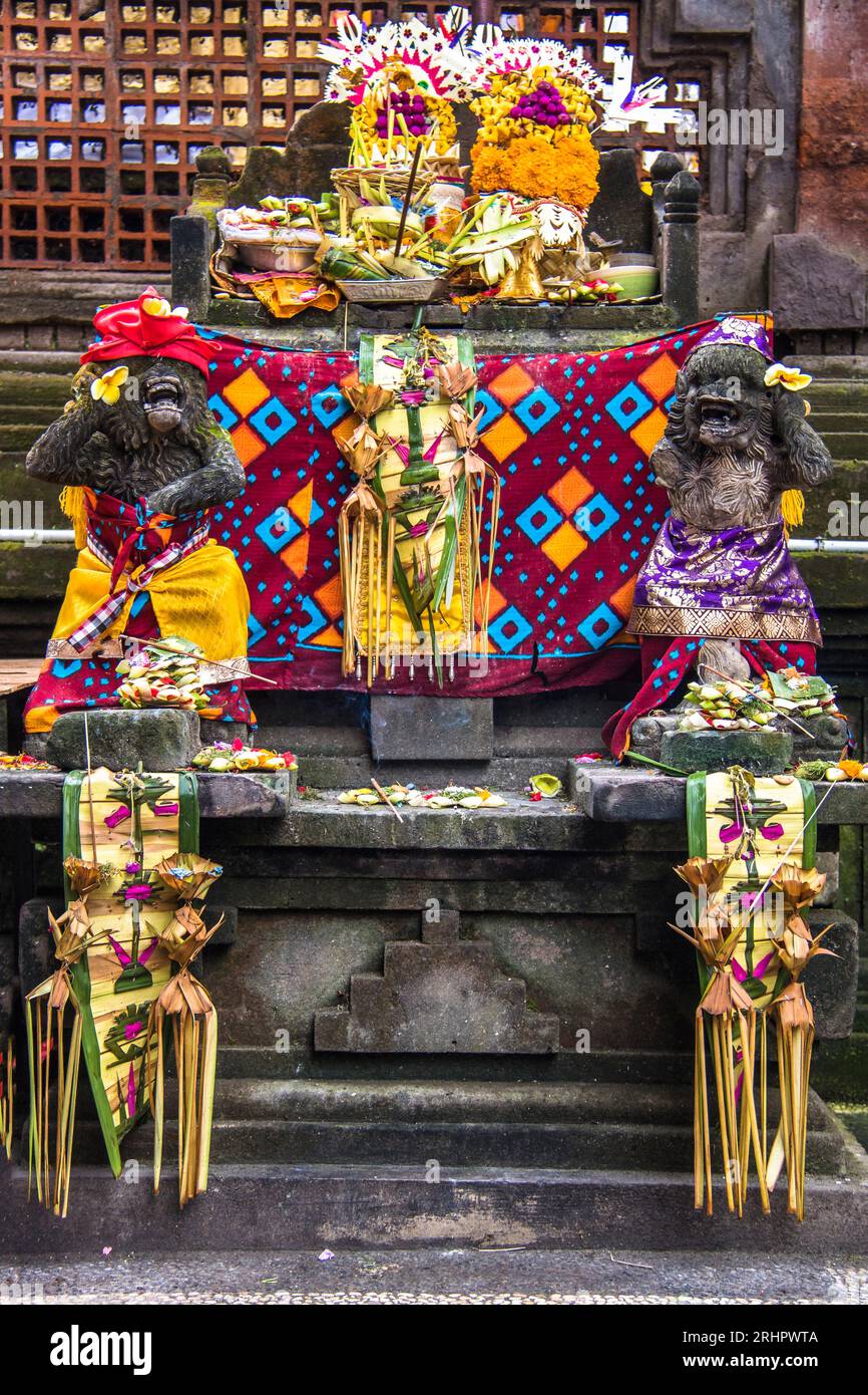 Stone statues colorful offerings hi-res stock photography and images ...