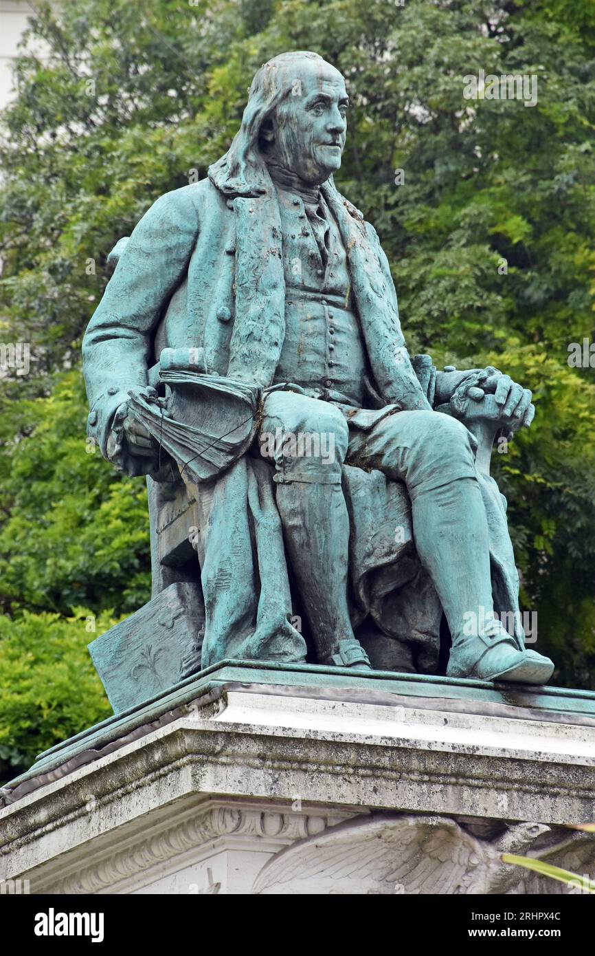 Bronze statue of the seated Benjamin Franklin, one of the Founding ...