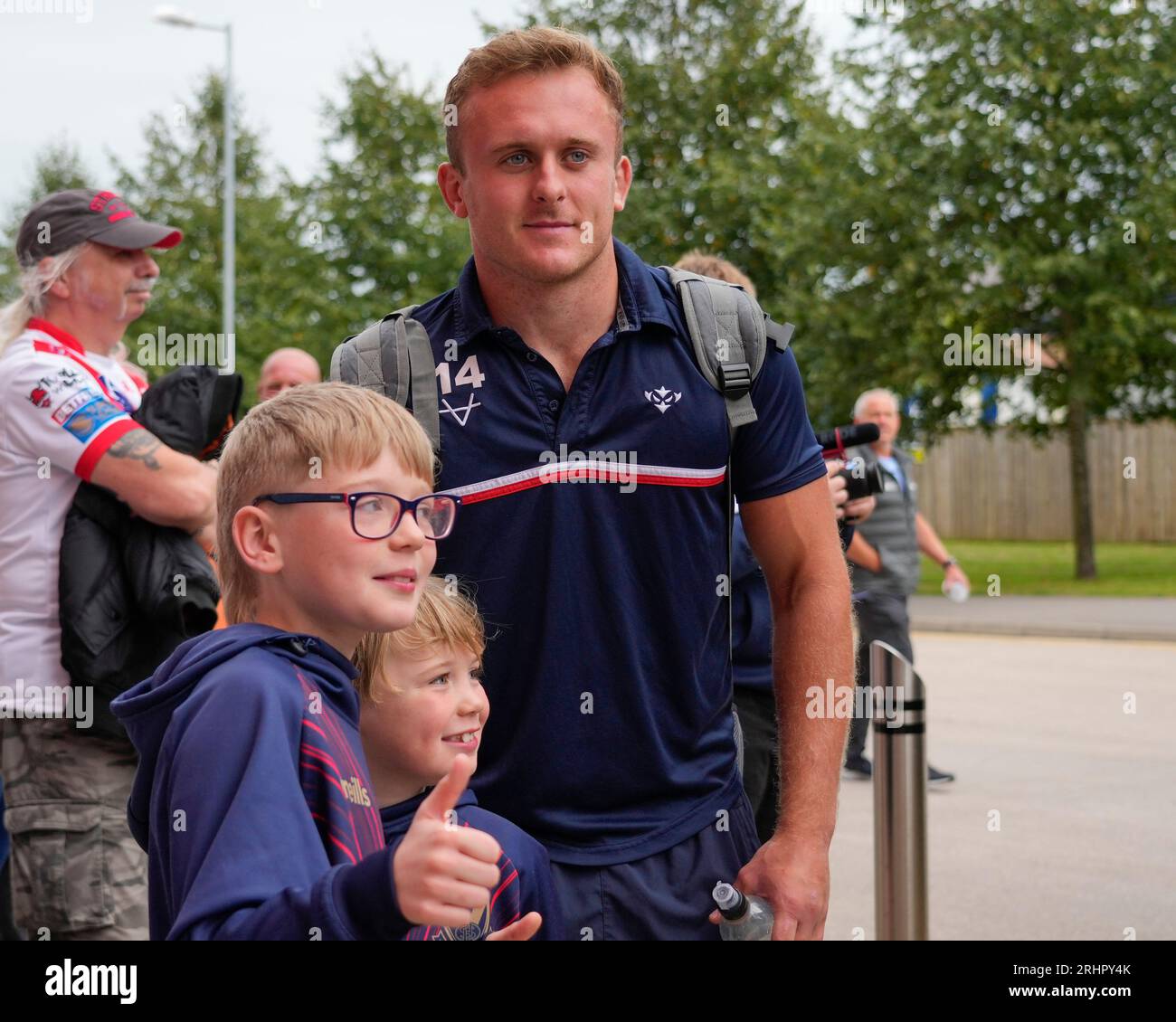 Jez Litten #14 of Hull KR poses for a photo with a fan the Betfred ...