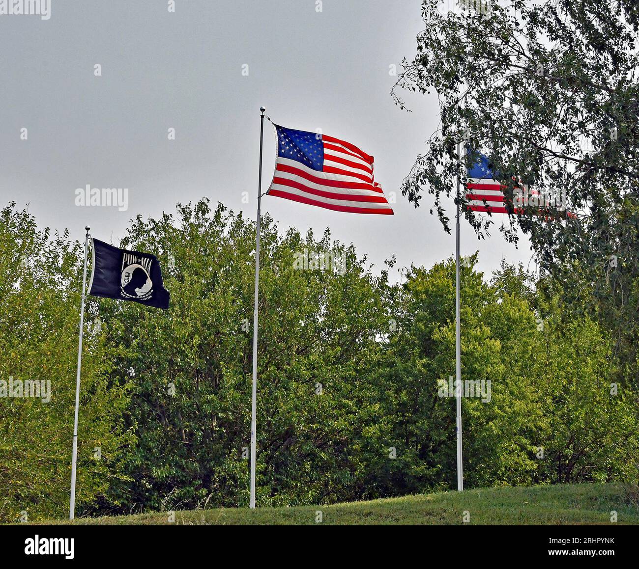 MARION, KANSAS - AUGUST 17, 2023 Local veteran has on lawn next to ...