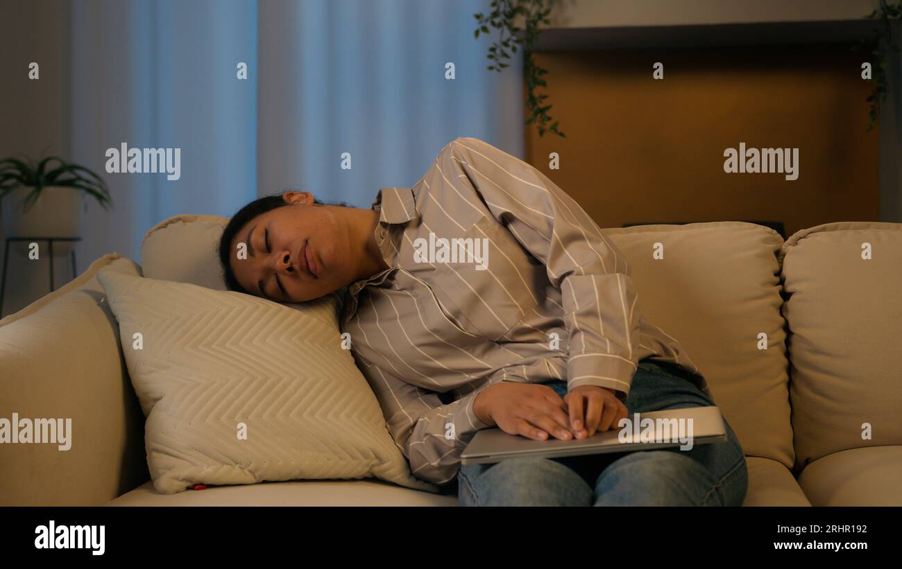 Tired exhausted African American businesswoman night working laptop ...