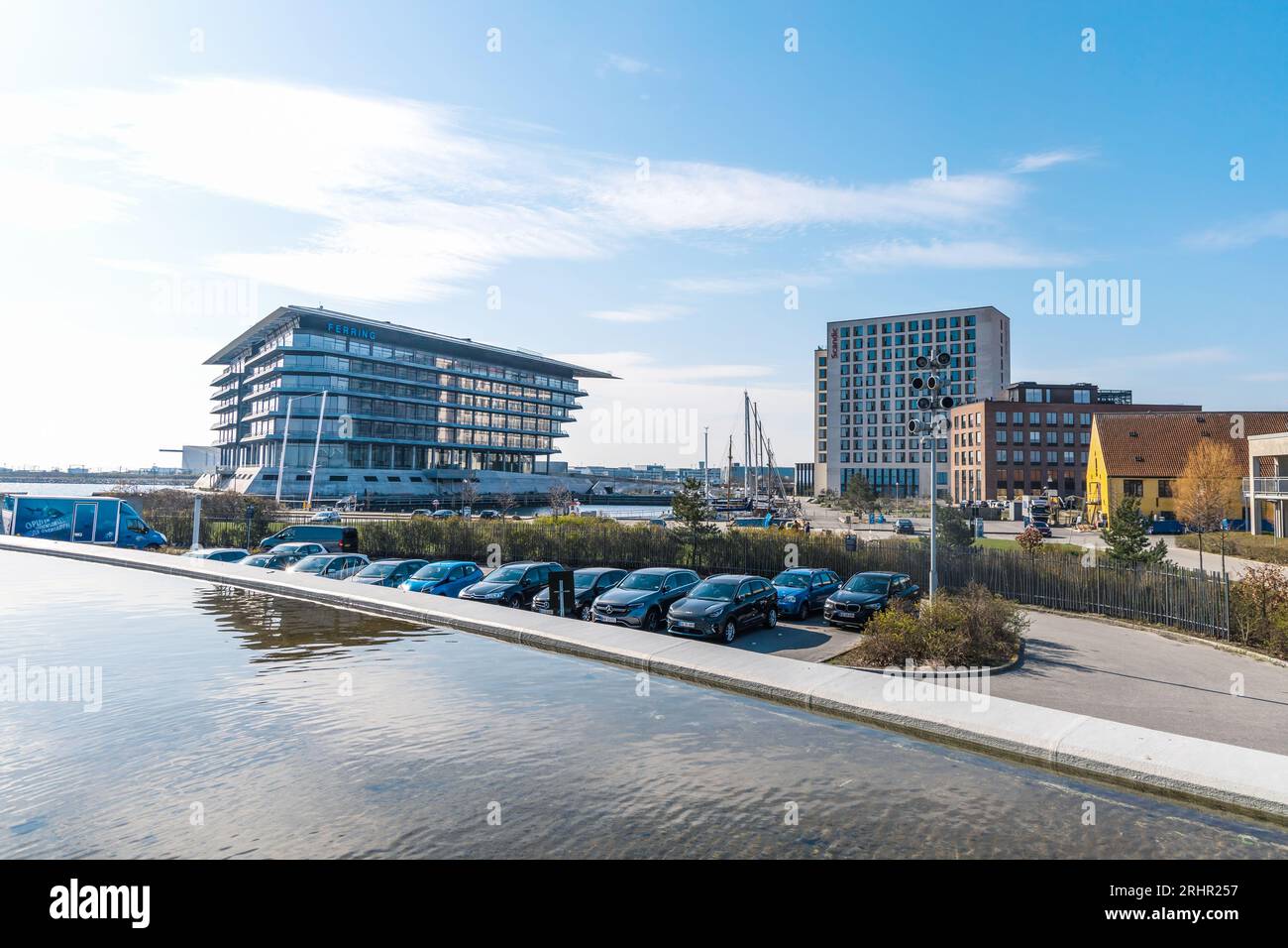 Modern architecture building and blue sky with clouds reflecting in the ...
