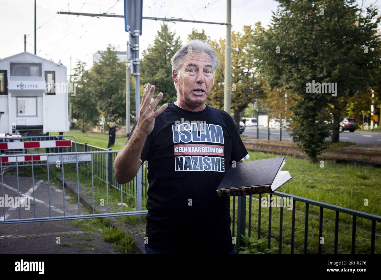 THE HAGUE - Pegida leader Edwin Wagensveld tears up a Quran during a ...