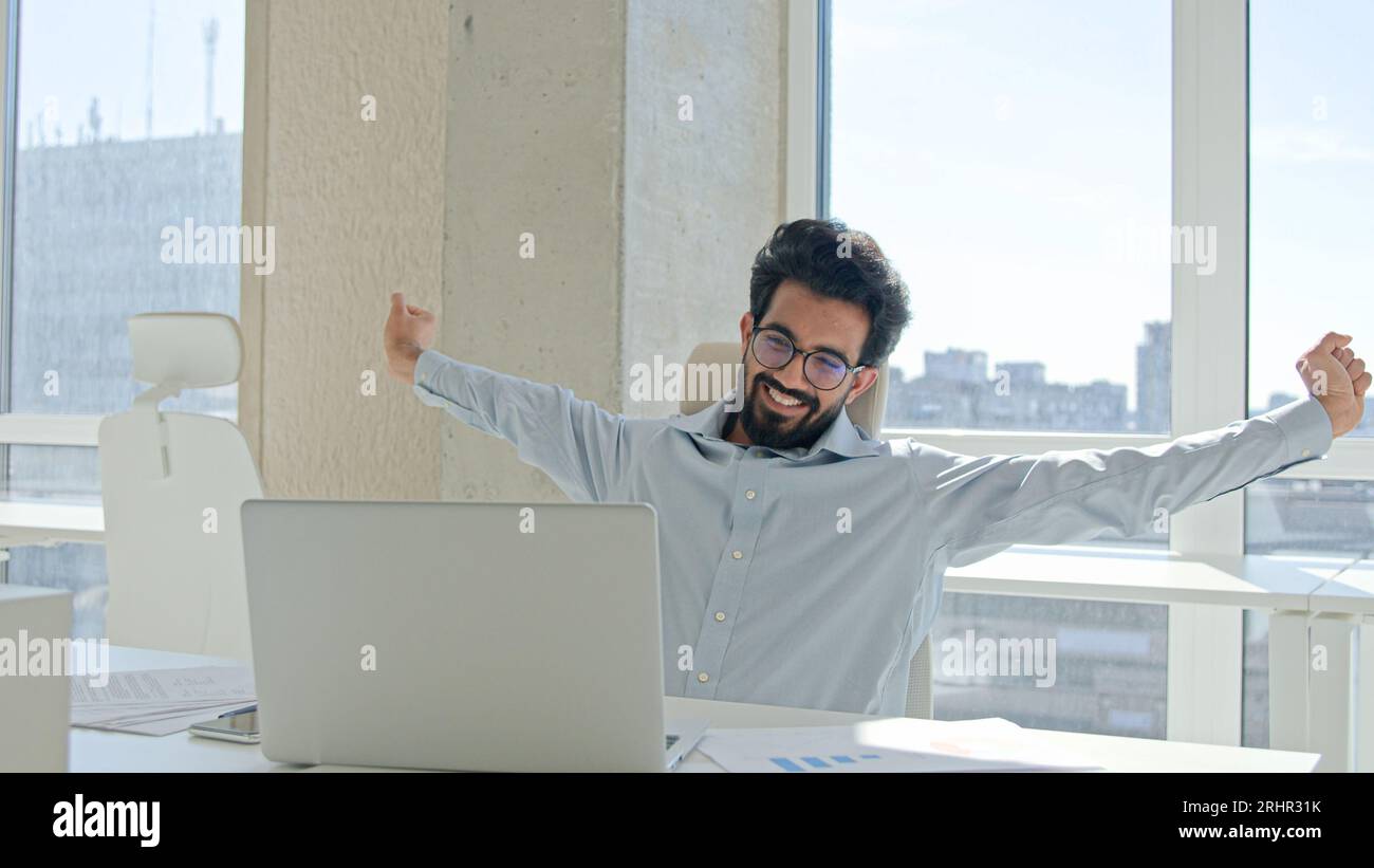 Happy office employee Arabian Indian man tired muslim businessman ...