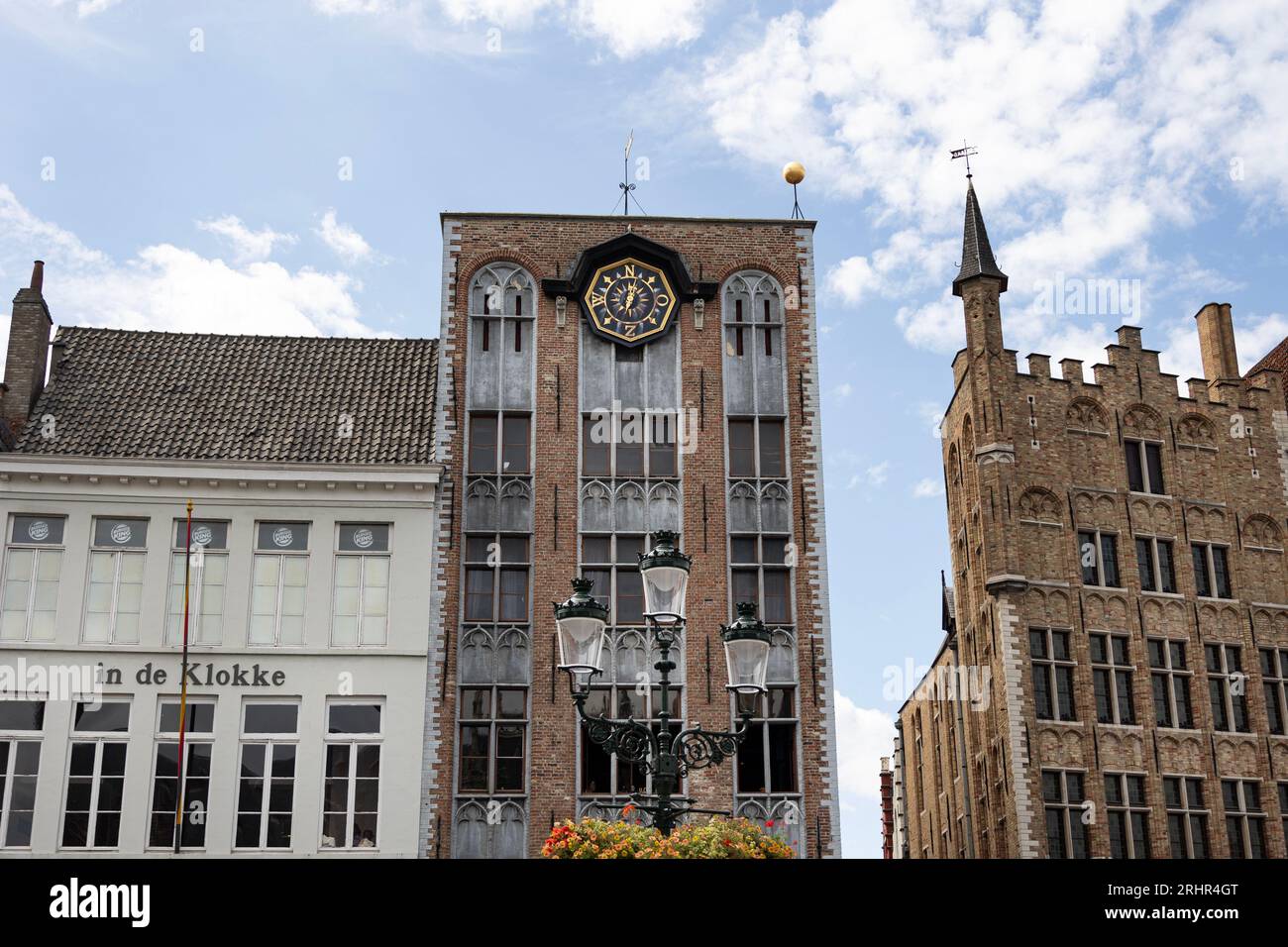 Buildings surrounding the market square in Bruge, Belgium Stock Photo ...