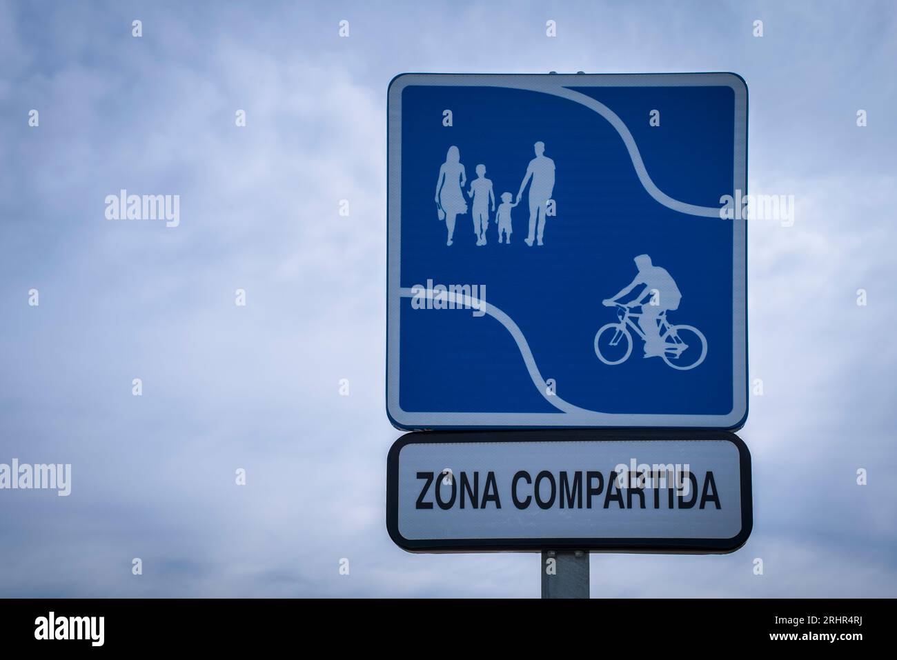A shared zone sign indicating where pedestrians and bicycles share the ...