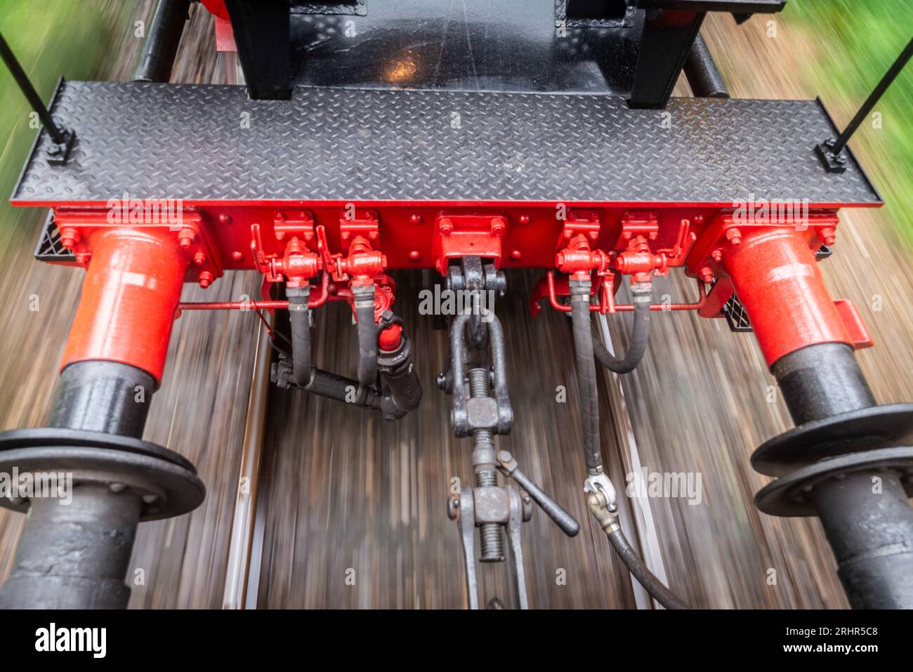 Looking down from eye point of view to a railway coupling of an ...