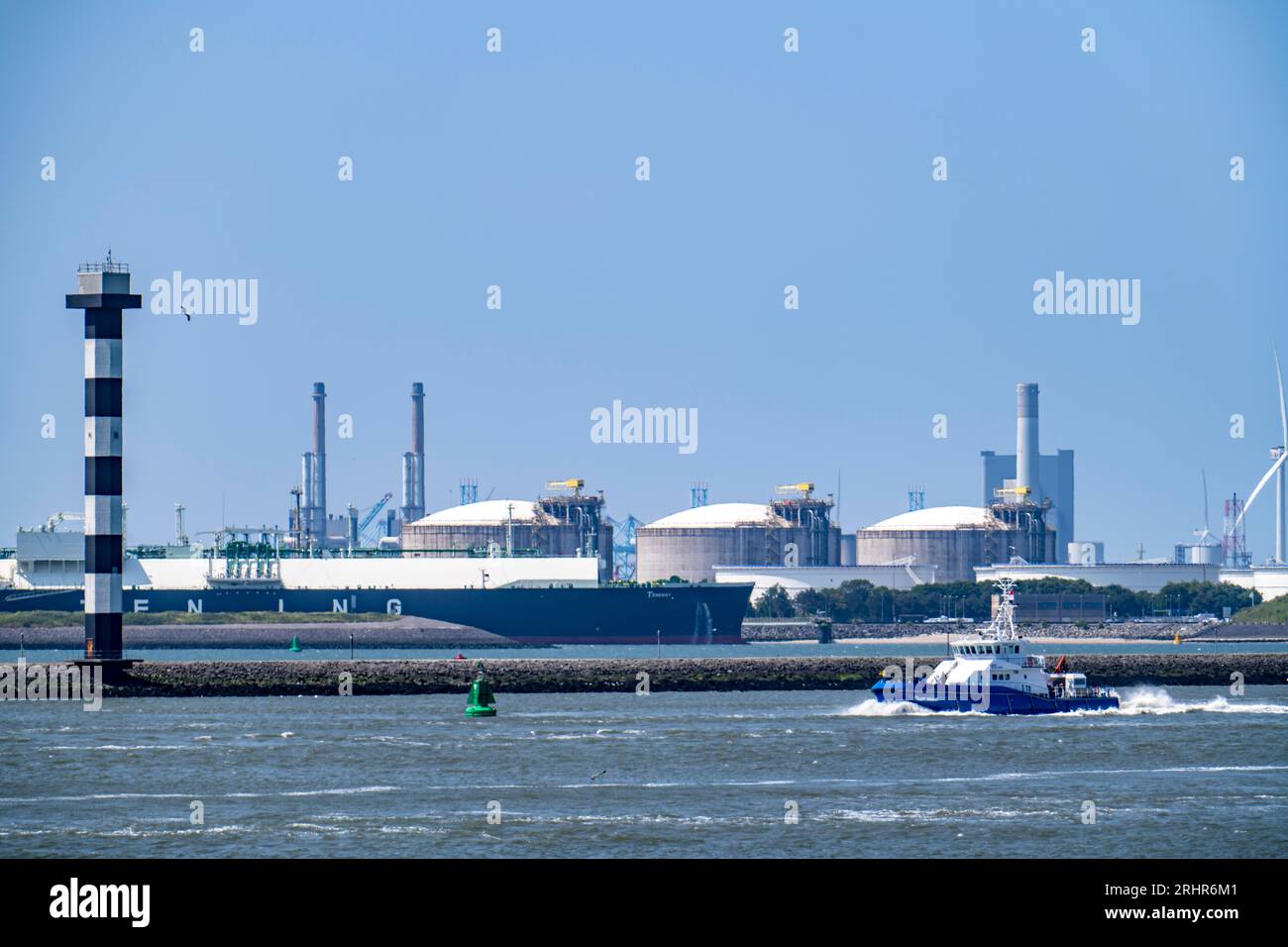 LNG import terminal tanks for liquefied natural gas in the seaport of Rotterdam, freighter ...