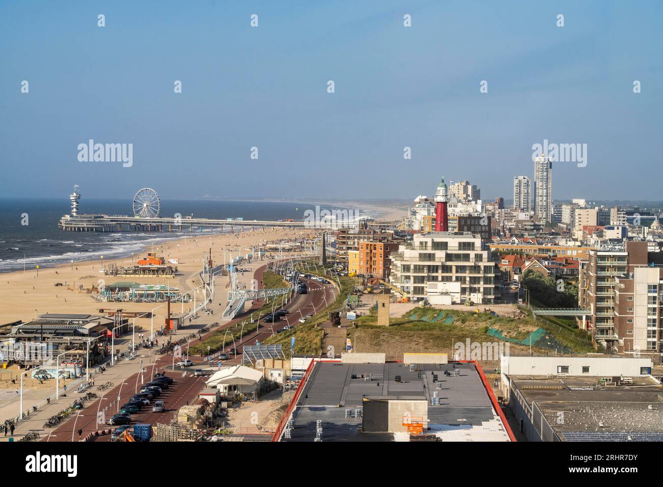 View over the beach of Scheveningen, the pier with Ferris wheel and the ...