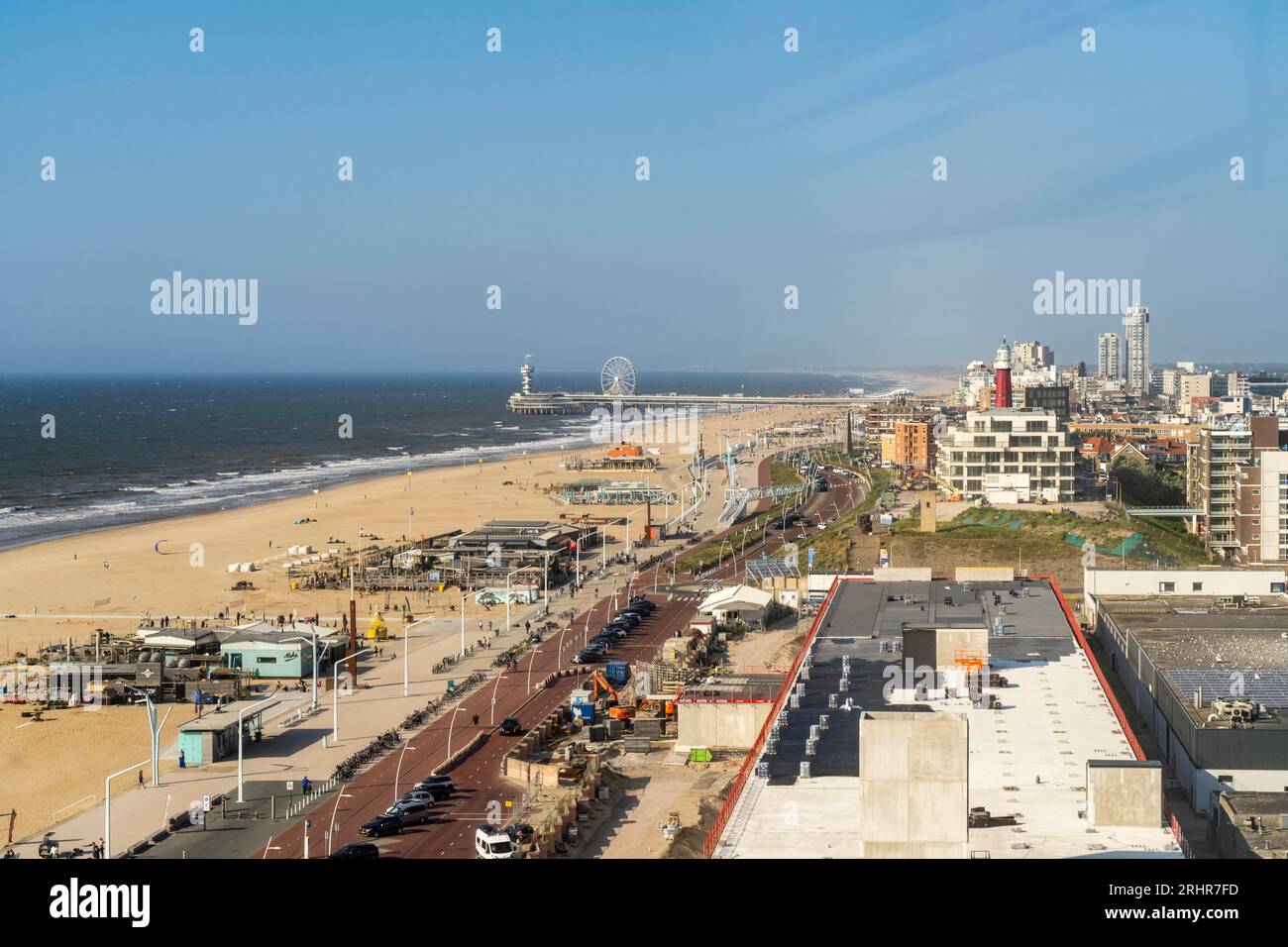 View over the beach of Scheveningen, the pier with Ferris wheel and the ...