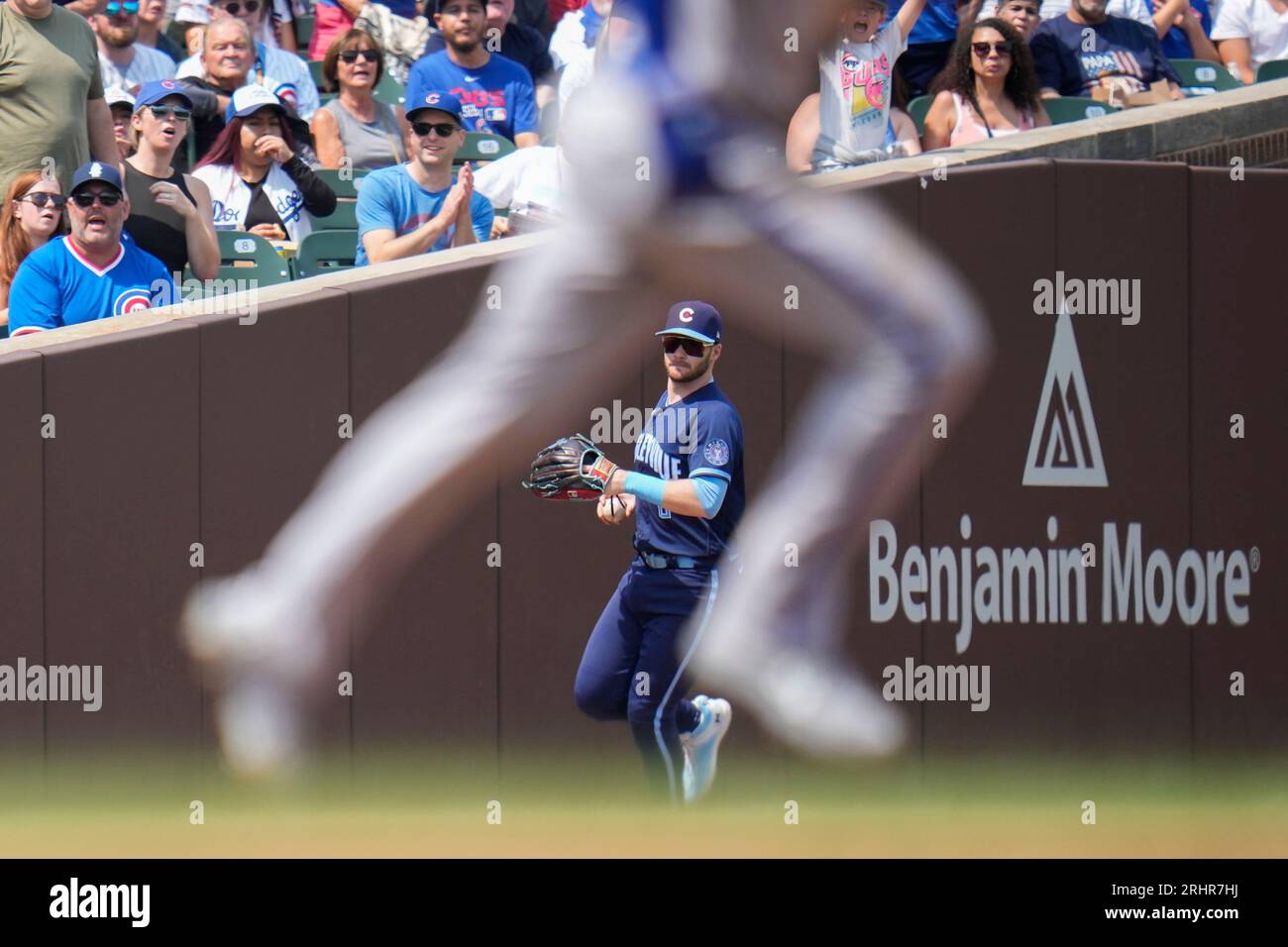 Chicago Cubs left fielder Ian Happ throws in from the outfield after ...