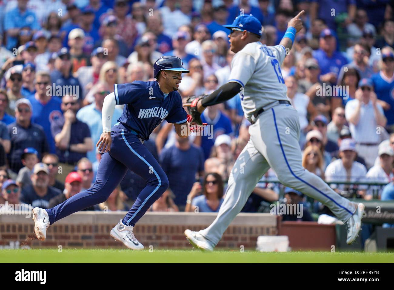Chicago Cubs' Christopher Morel, left, is caught stealing home as ...