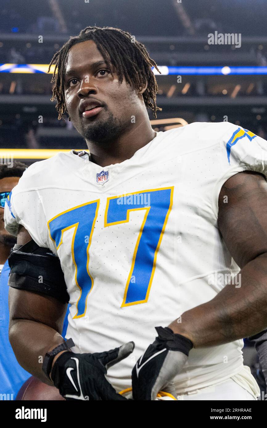 Los Angeles Chargers guard Zion Johnson (77) walks back to the locker ...