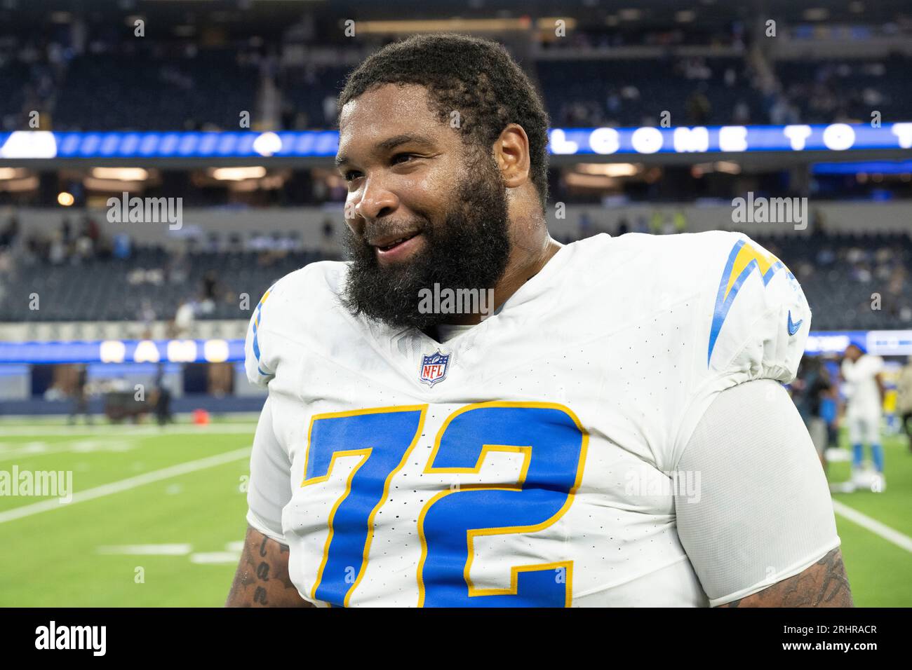 Los Angeles Chargers defensive tackle Jerrod Clark (72) walks back to ...