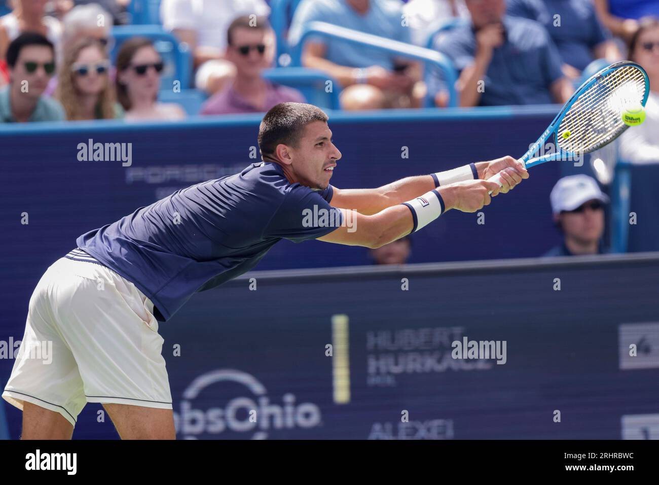 August 18, 2023, Mason, Ohio, USA: Alexei Popyrin (AUS) stretches to ...