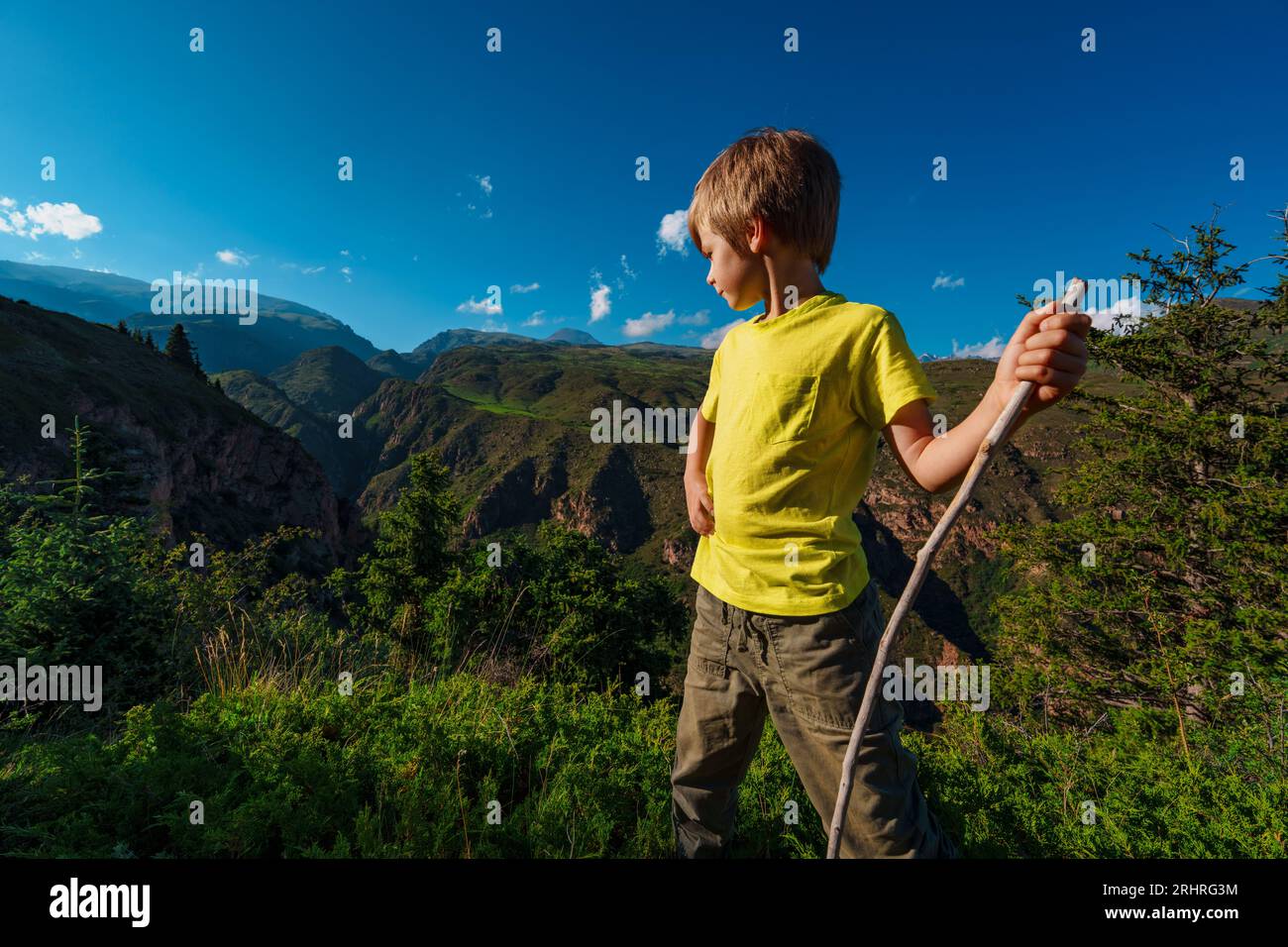 Cute boy stands looks hi-res stock photography and images - Alamy