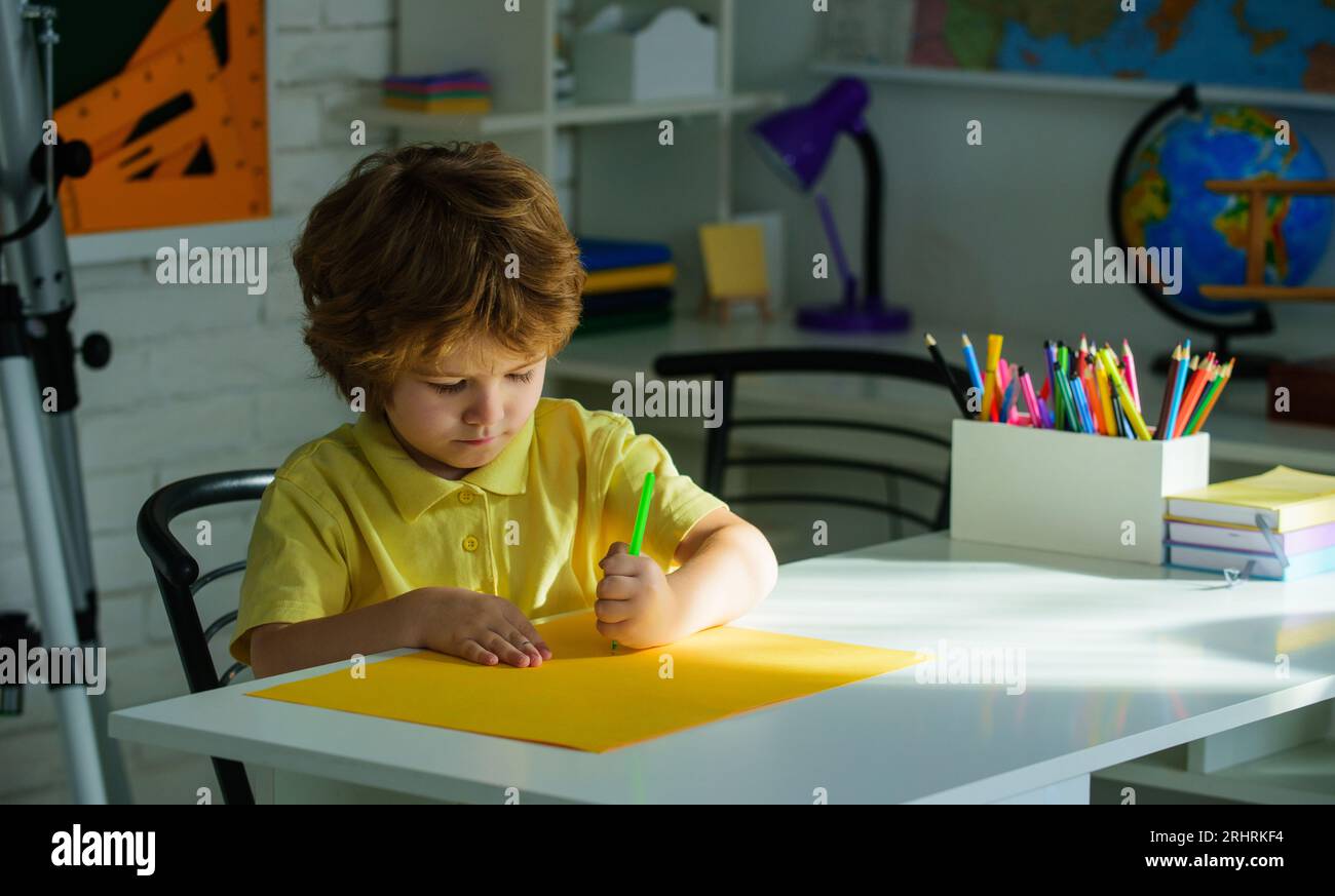 Back to school. Schoolboy doing school homework for elementary school ...