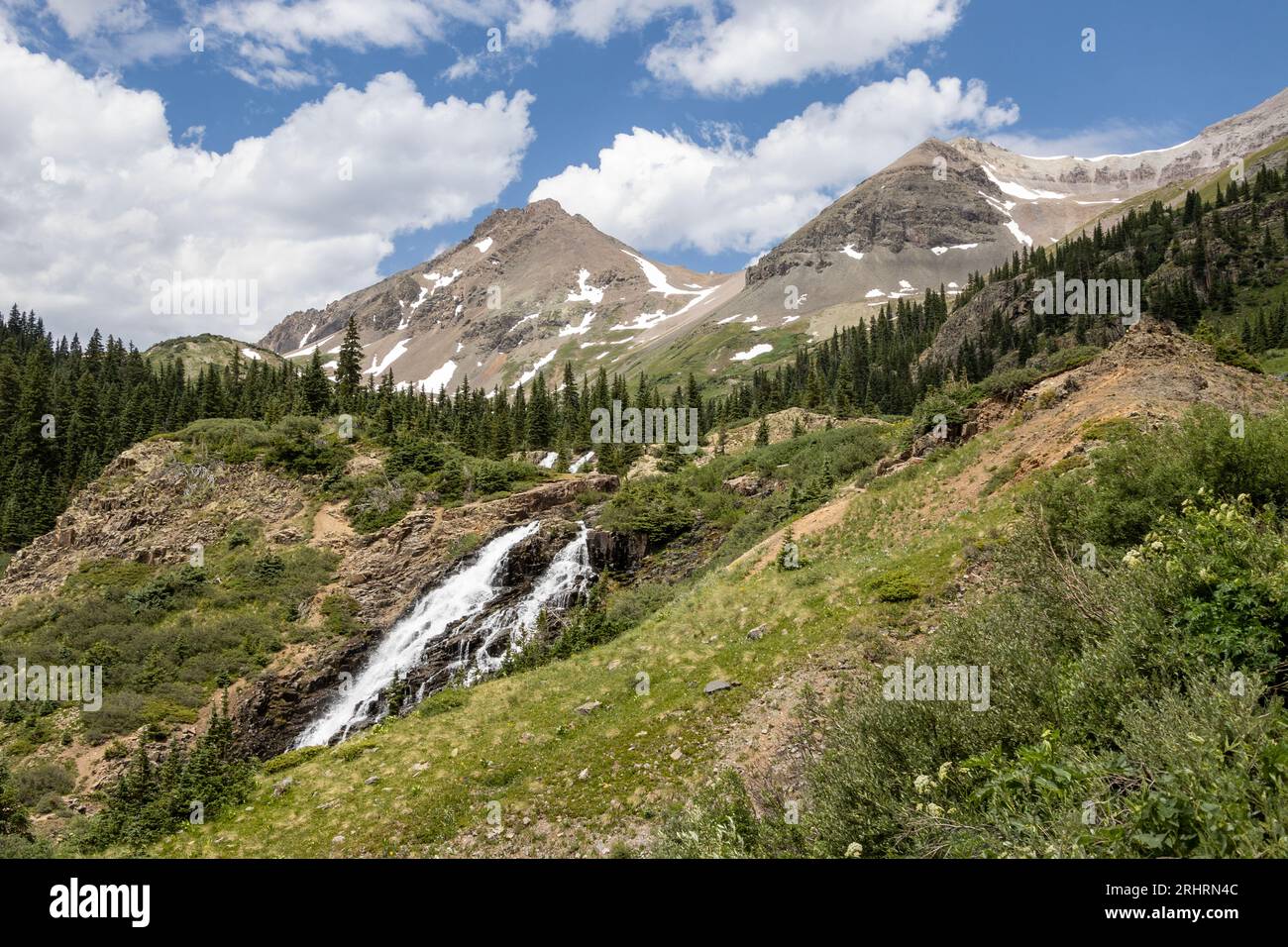 Beautiful Twin waterfalls with mountains in the backdrop Stock Photo ...