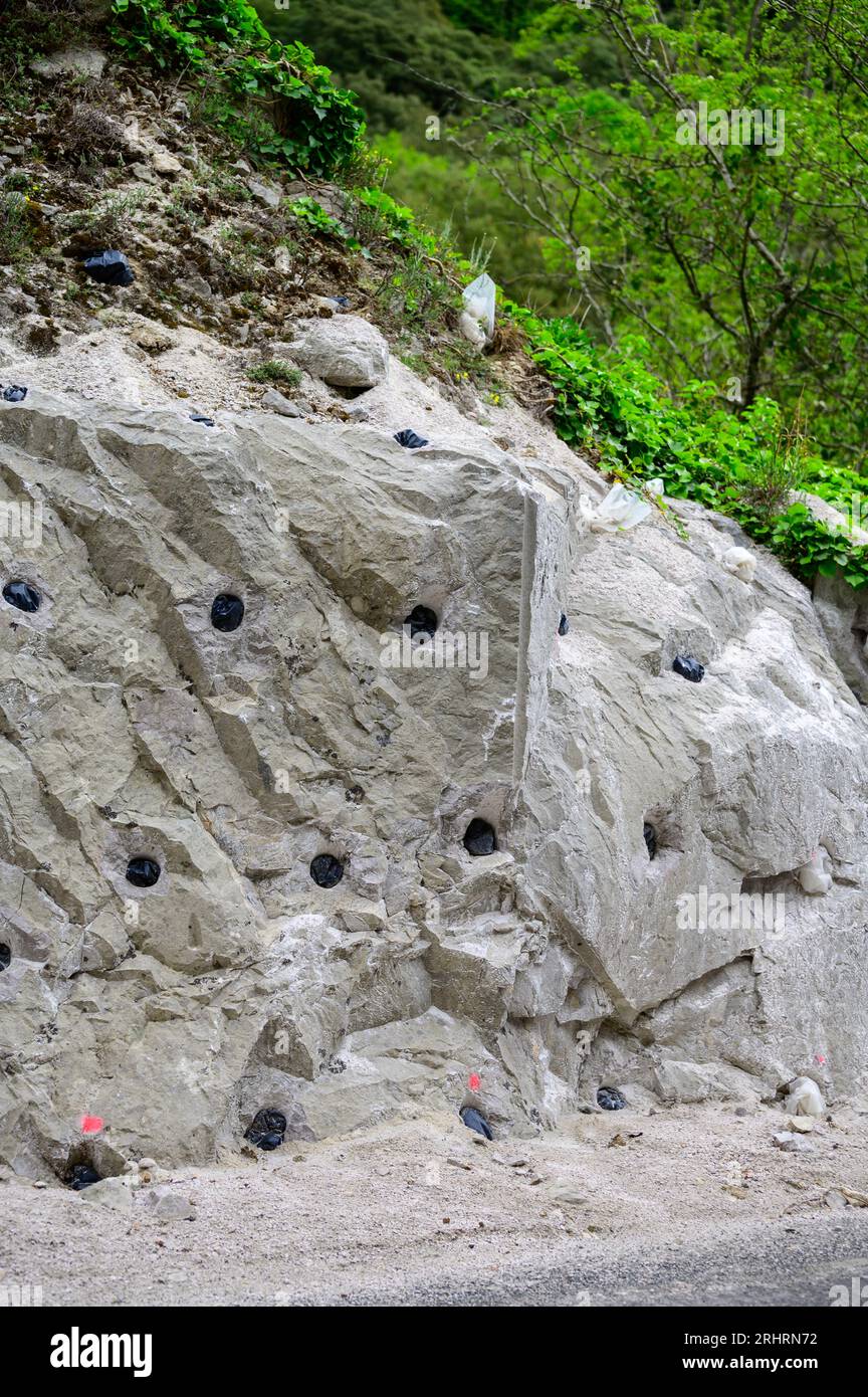 Road construstion works, dynamite hols for blasting of rock in ...