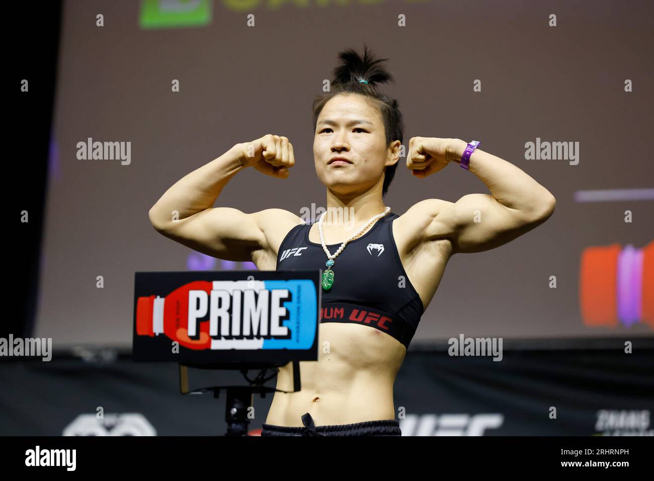 UFC Strawweight Champion Weili Zhang poses at a ceremonial weigh-in for ...