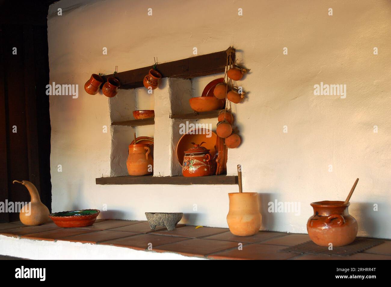 Traditional pottery and food are on display at the Olivera House, an ...