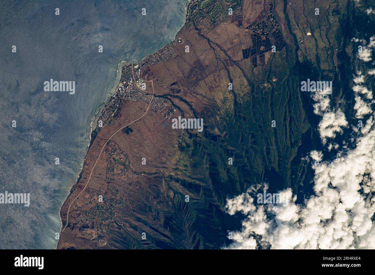 Maui, United States. 08 August, 2023. The brown burn scar and town of ...