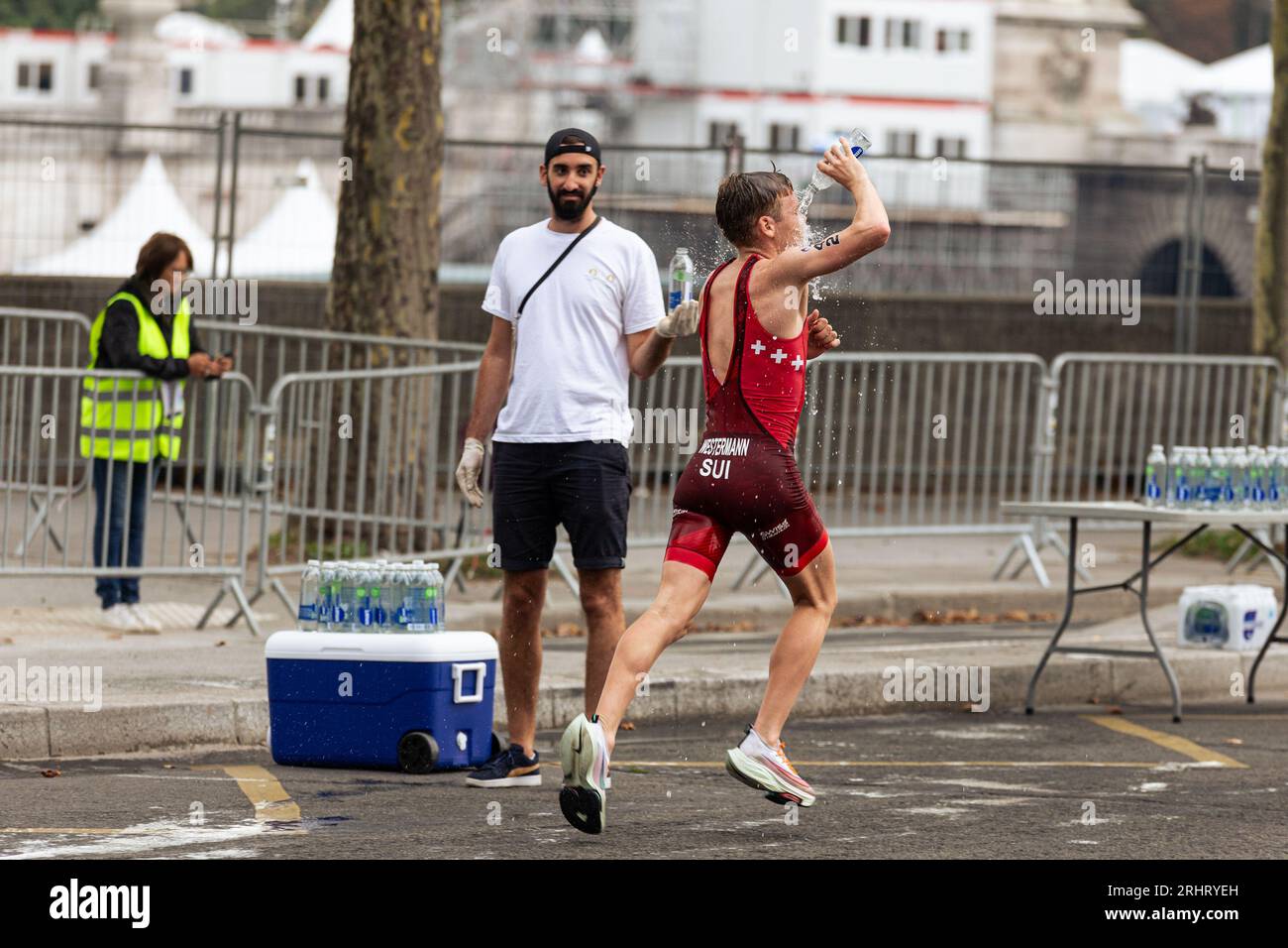 Swiss athlete Simon Westermann seen pouring fresh water during the men ...