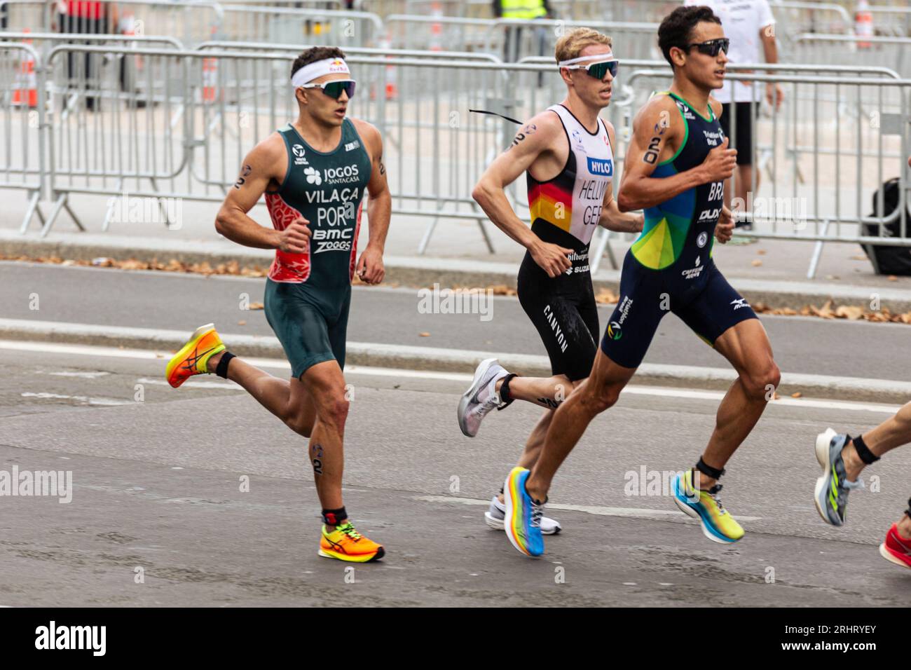 Triathletes seen running during the men's individual test event. One ...