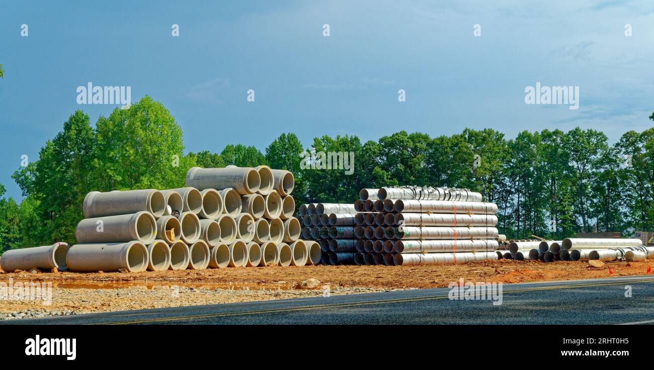 Concrete sewer pipes at a residential construction site Stock Photo - Alamy