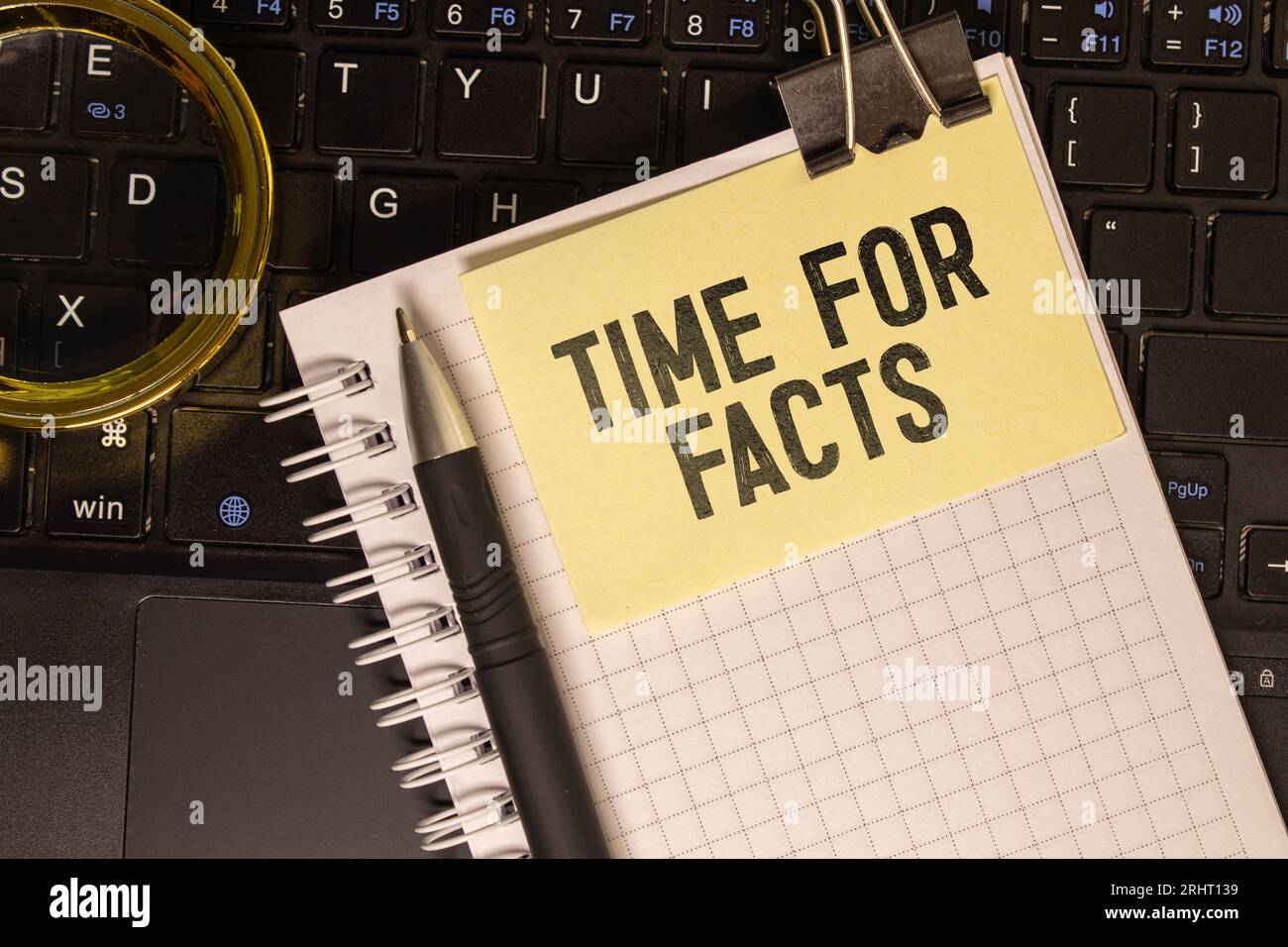 TIME for FACTS text on a torn page from a notebook on a background of ...