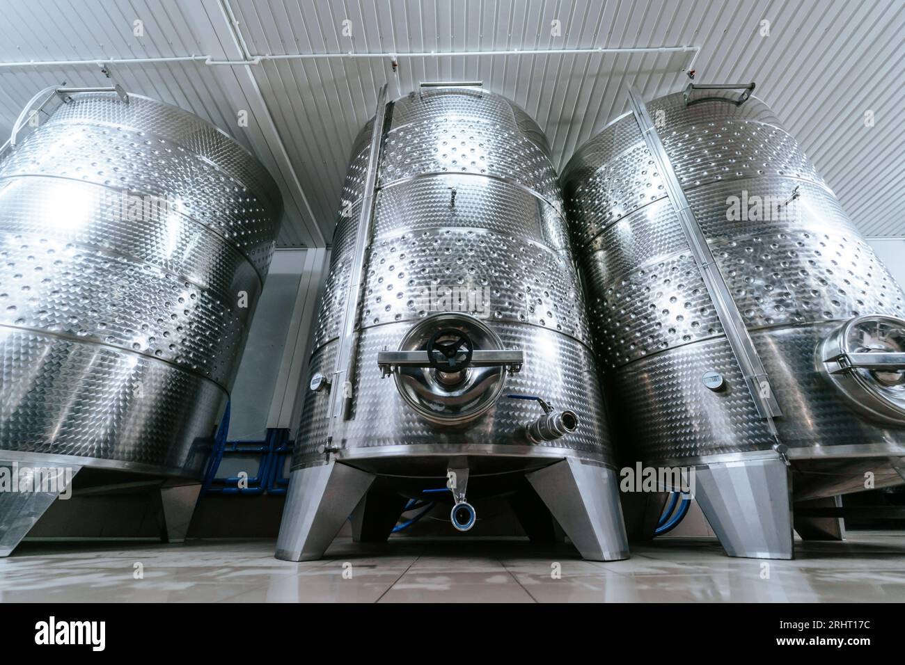 Modern winery with stell barrels Stock Photo - Alamy