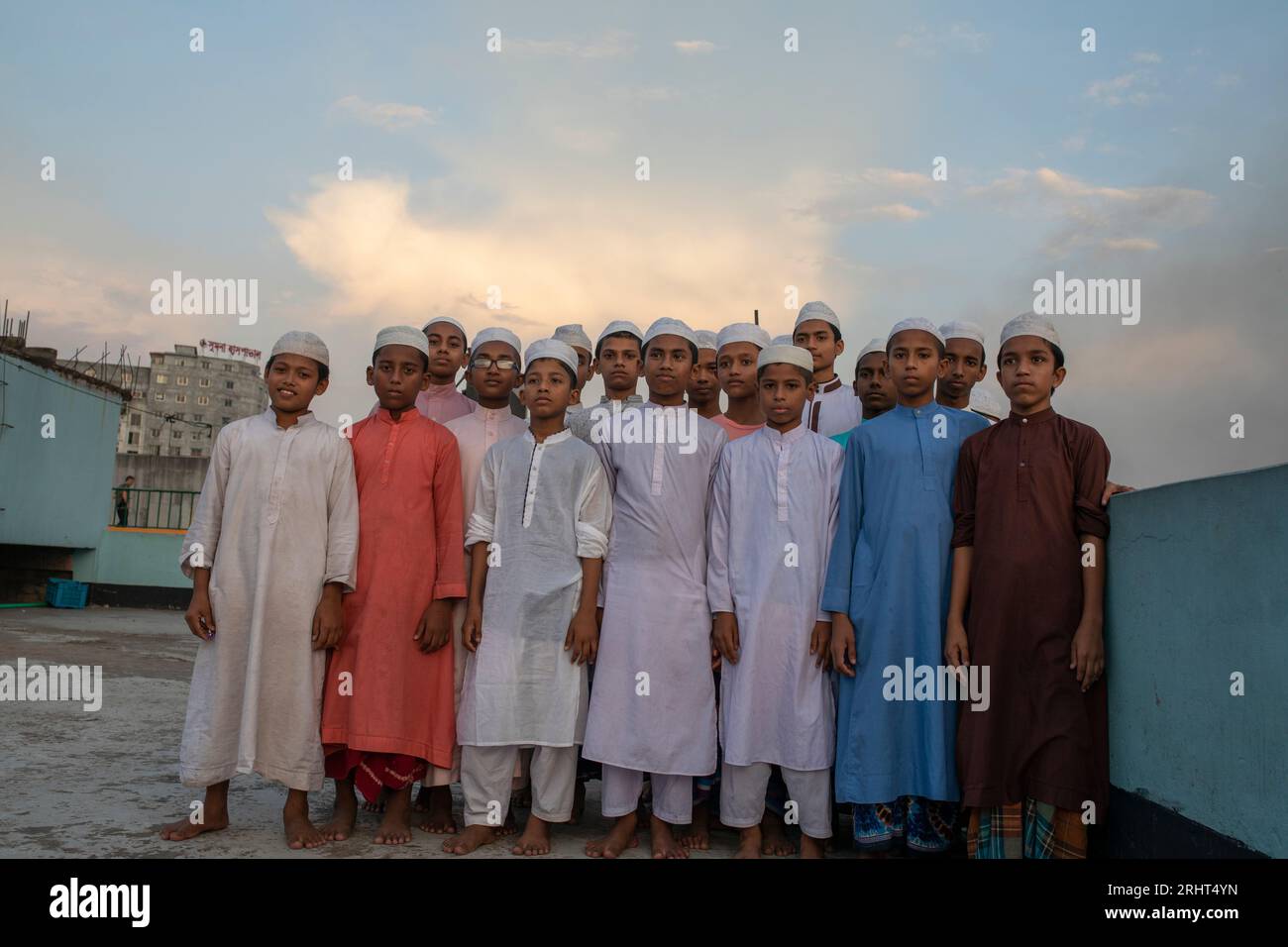 A group of students on the roof top of a madrasha (islamic school) in ...