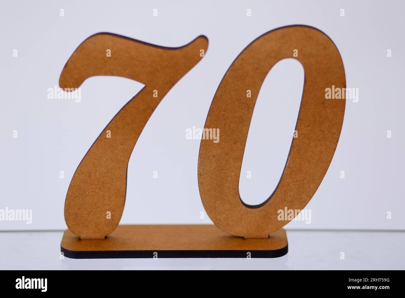 sculpture of number seventy made of wood - party seventy years Stock ...